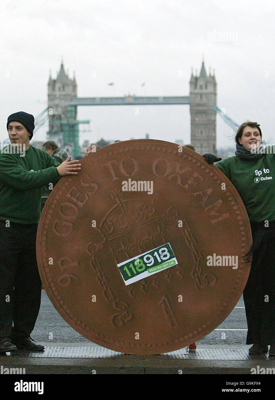 Giant penny coins are rolled over London Bridge to launch a new ...
