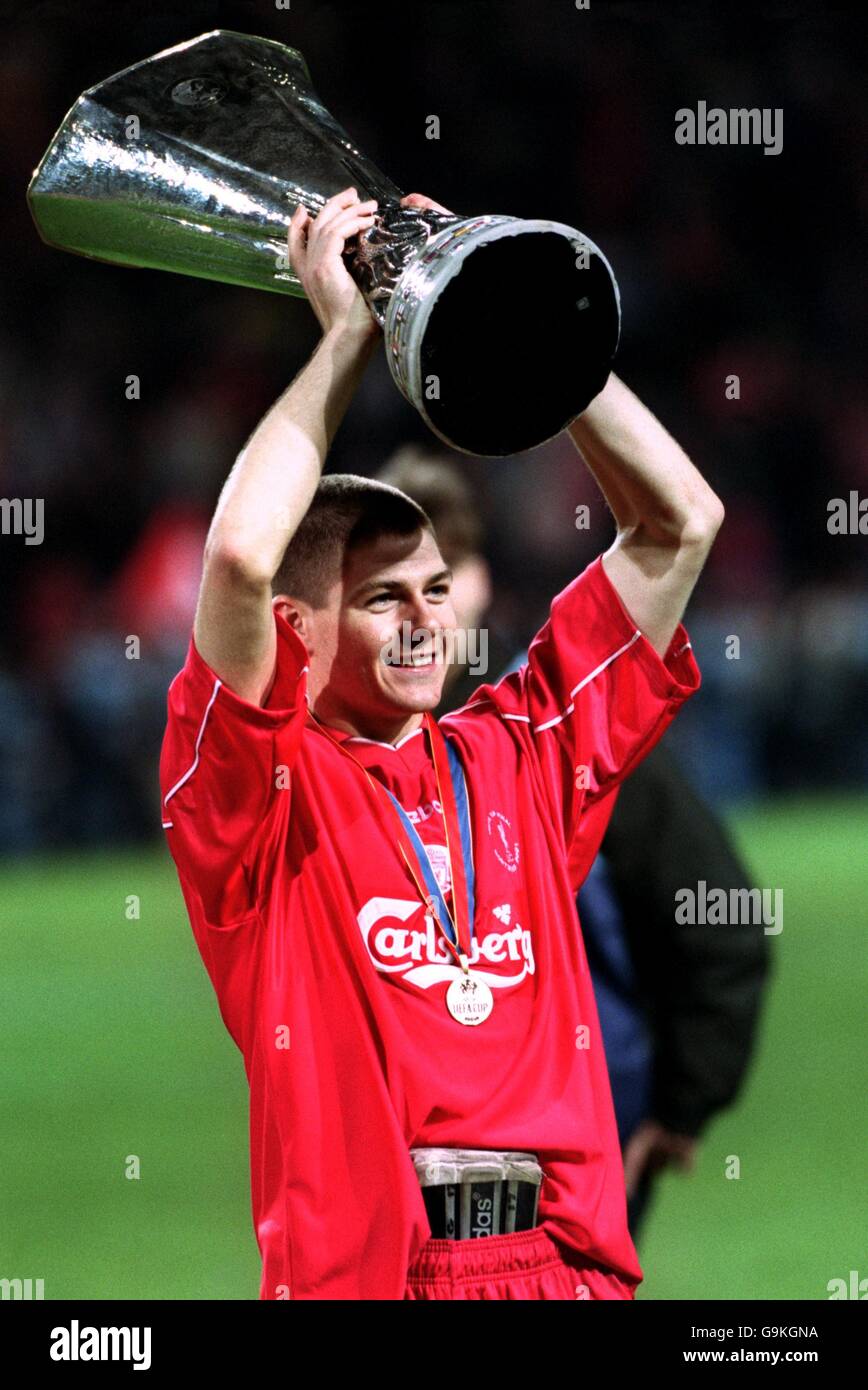 Liverpool's Steven Gerrard celebrates winning with the UEFA Cup Trophy ...