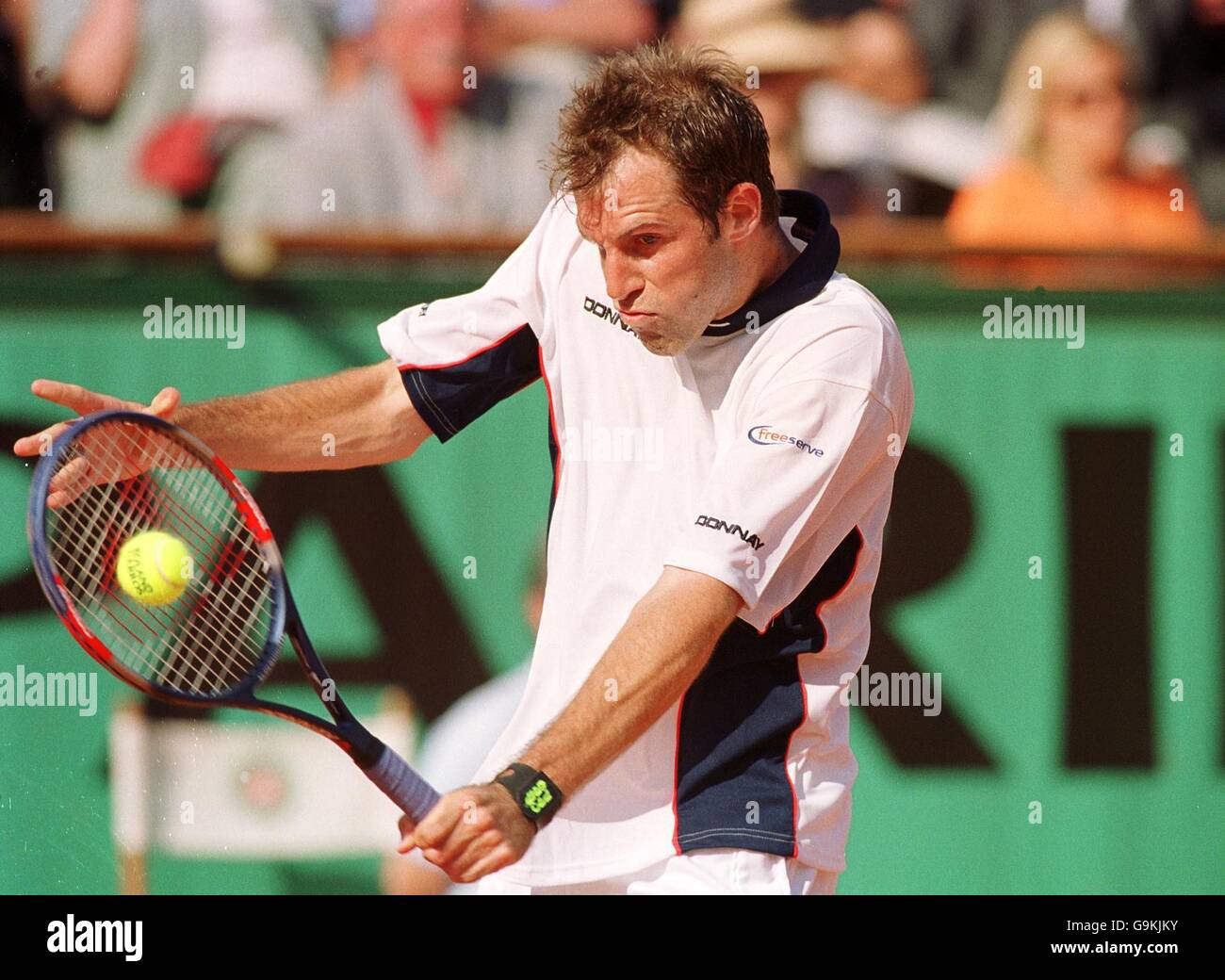 Tennis - French Open - Second Round. Greg Rusedski strikes a backhand ...