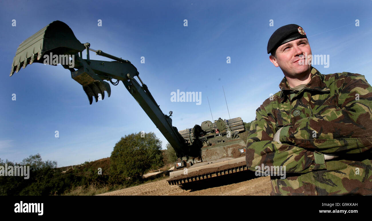 Corporal Andrew Jones stands beside the Army's new heavily armoured ...