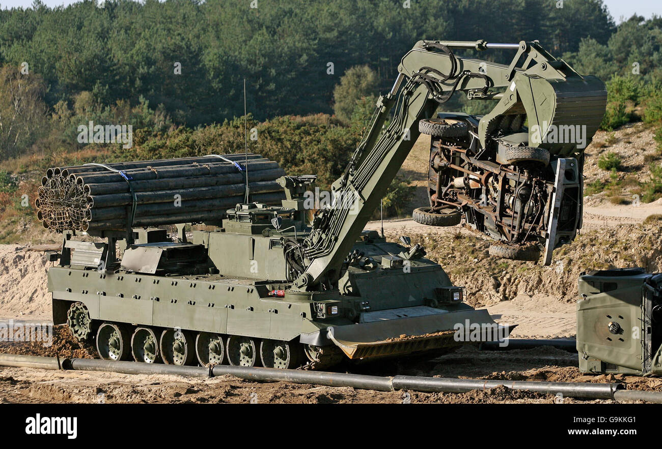 The Army's new heavily armoured engineer tank Trojan moves obstacles ...