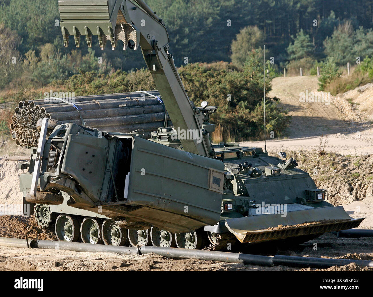The Army's new heavily armoured engineer tank Trojan moves obstacles ...