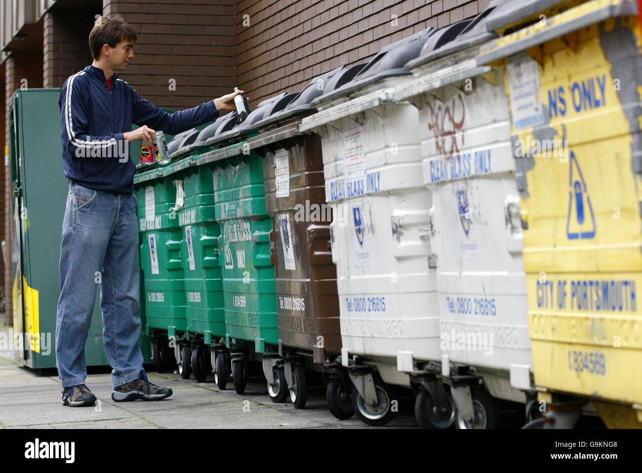A man recycles glass bottles in Portsmouth, on the day a poll was ...