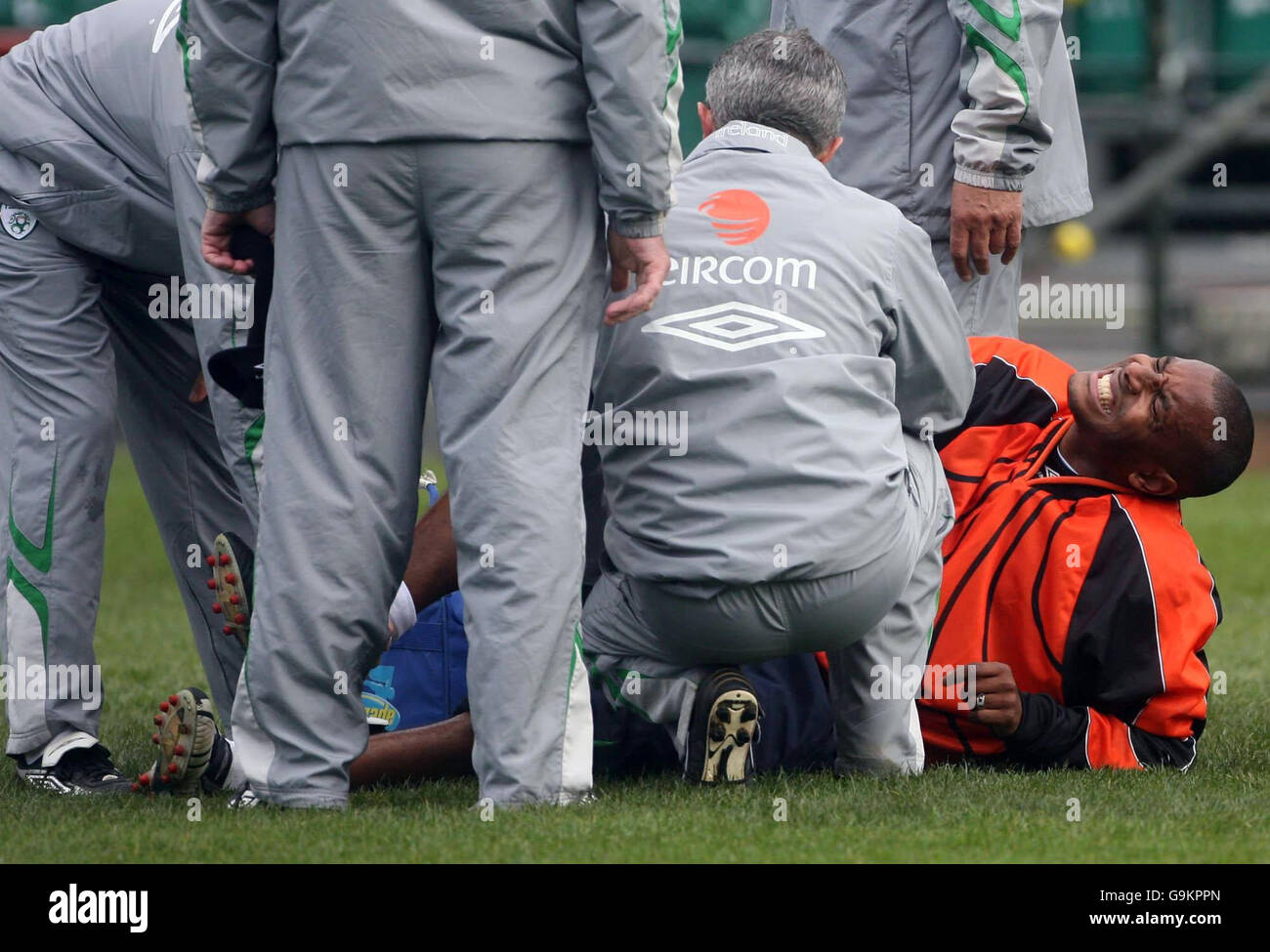 Republic of Ireland's Clinton Morrison lies on the ground injured ...