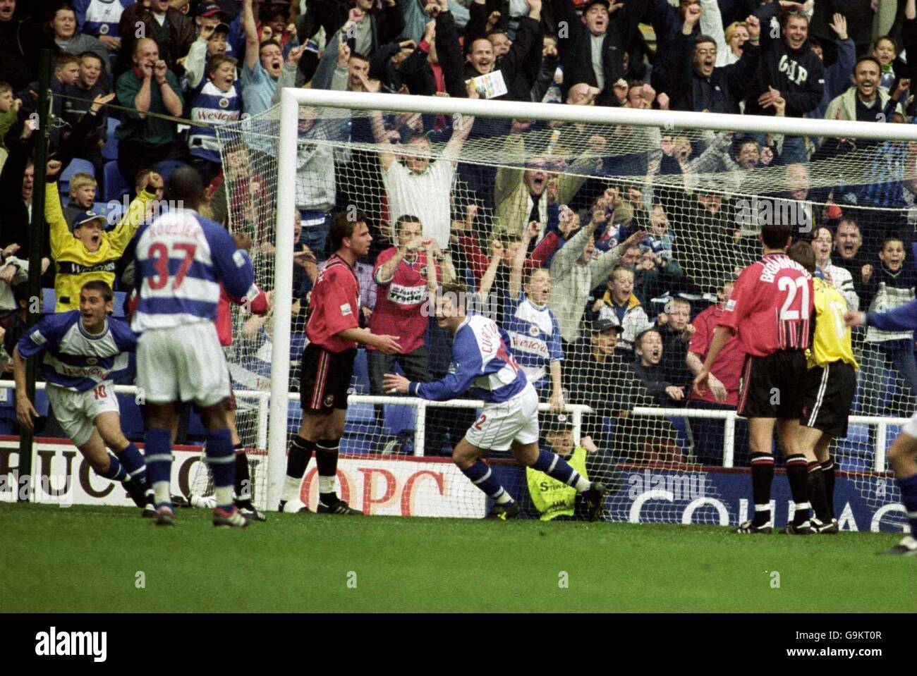Reading's substitute Nicky Forster (far left) turns away after scoring ...