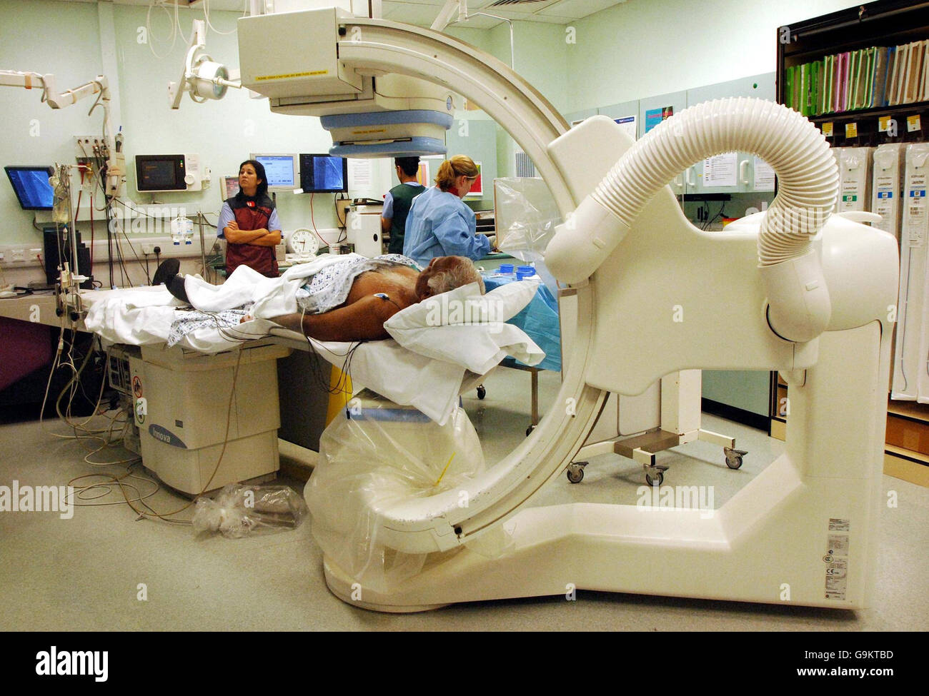 Generic stock image. An X-Ray machine during angiogram proceedure at ...