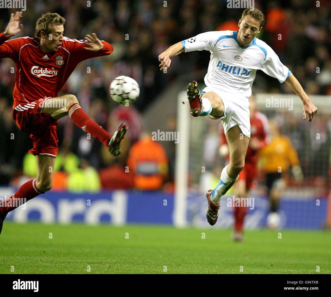 PSV Eindhoven's Jan Kromkamp (right) and Liverpool's Peter Crouch ...