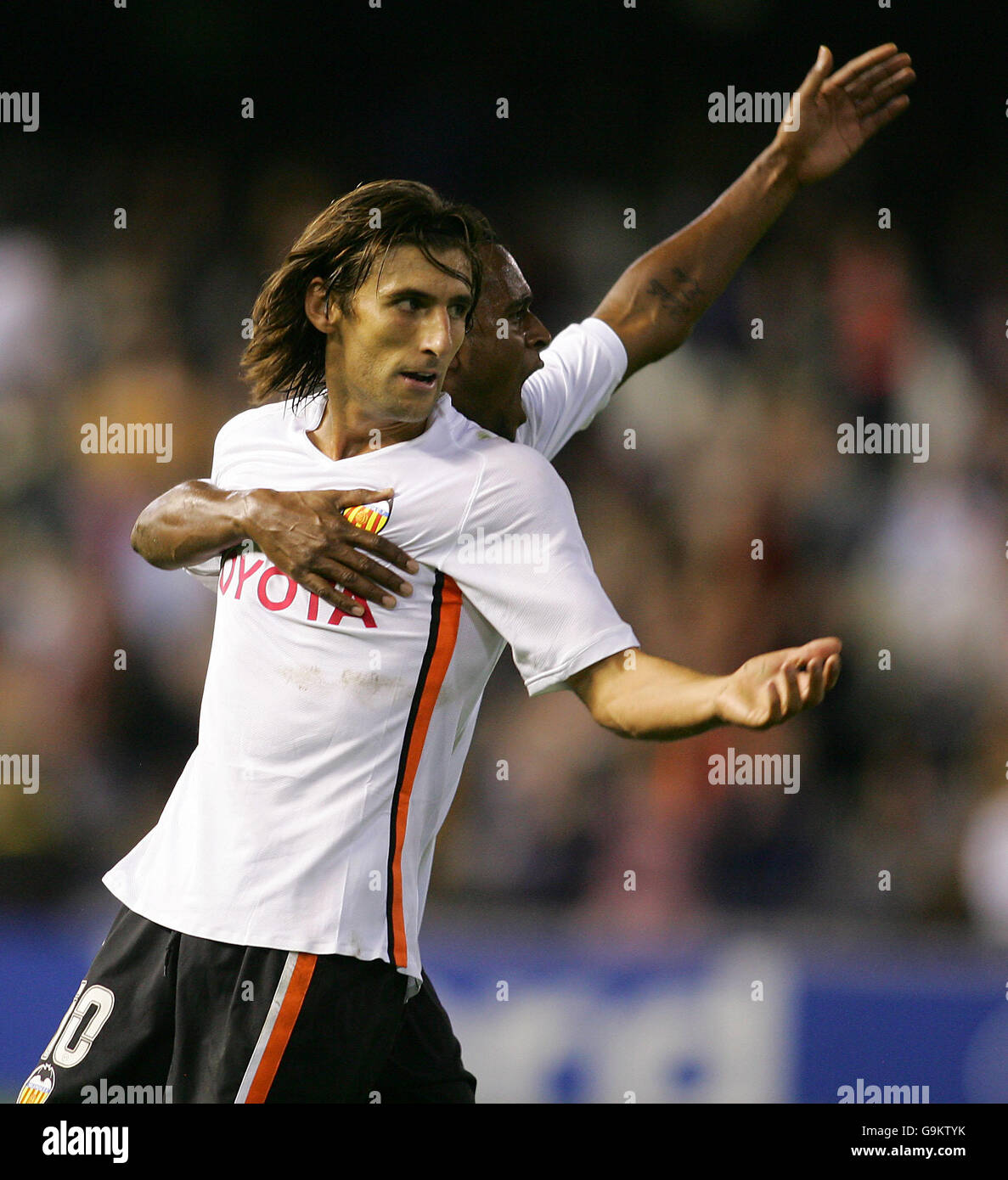 Valencias miguel angel angulo celebrates his goal with luis miguel hi ...