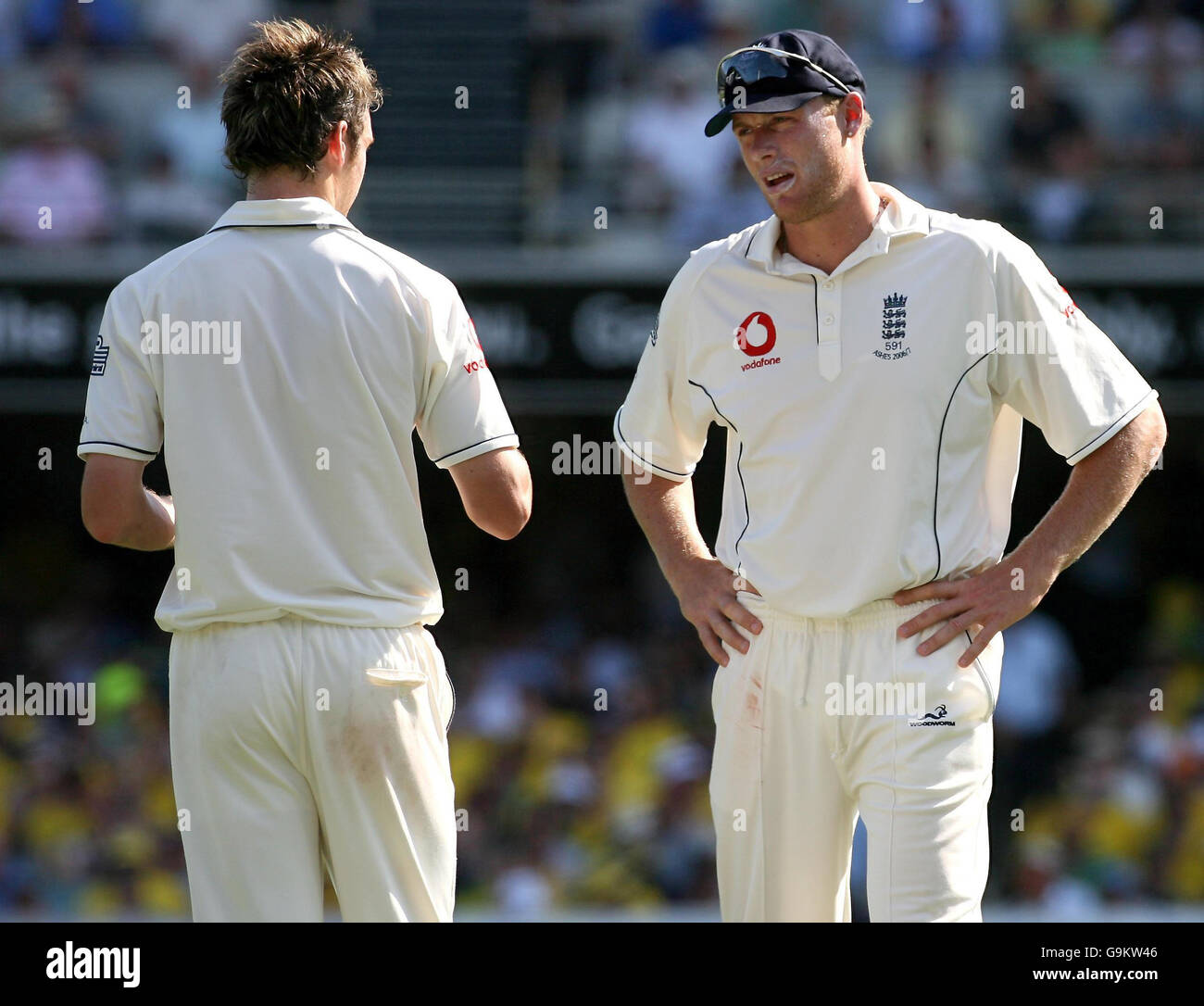 England captain Andrew Flintoff (right) speaks to James Anderson during ...