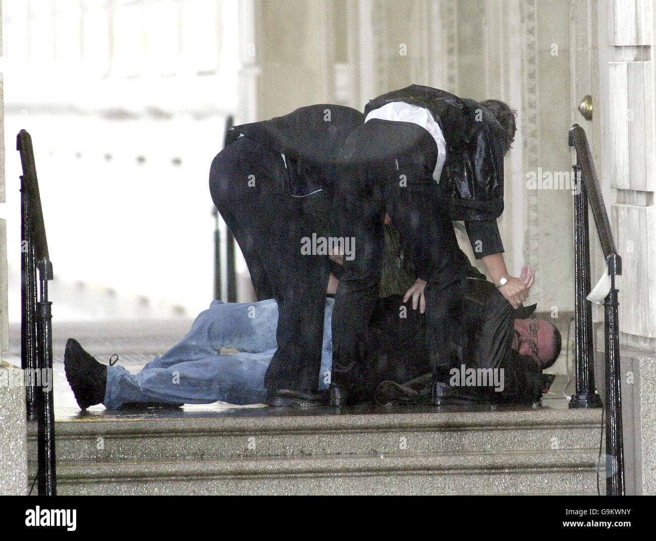 Being restrained by staff hi-res stock photography and images - Alamy