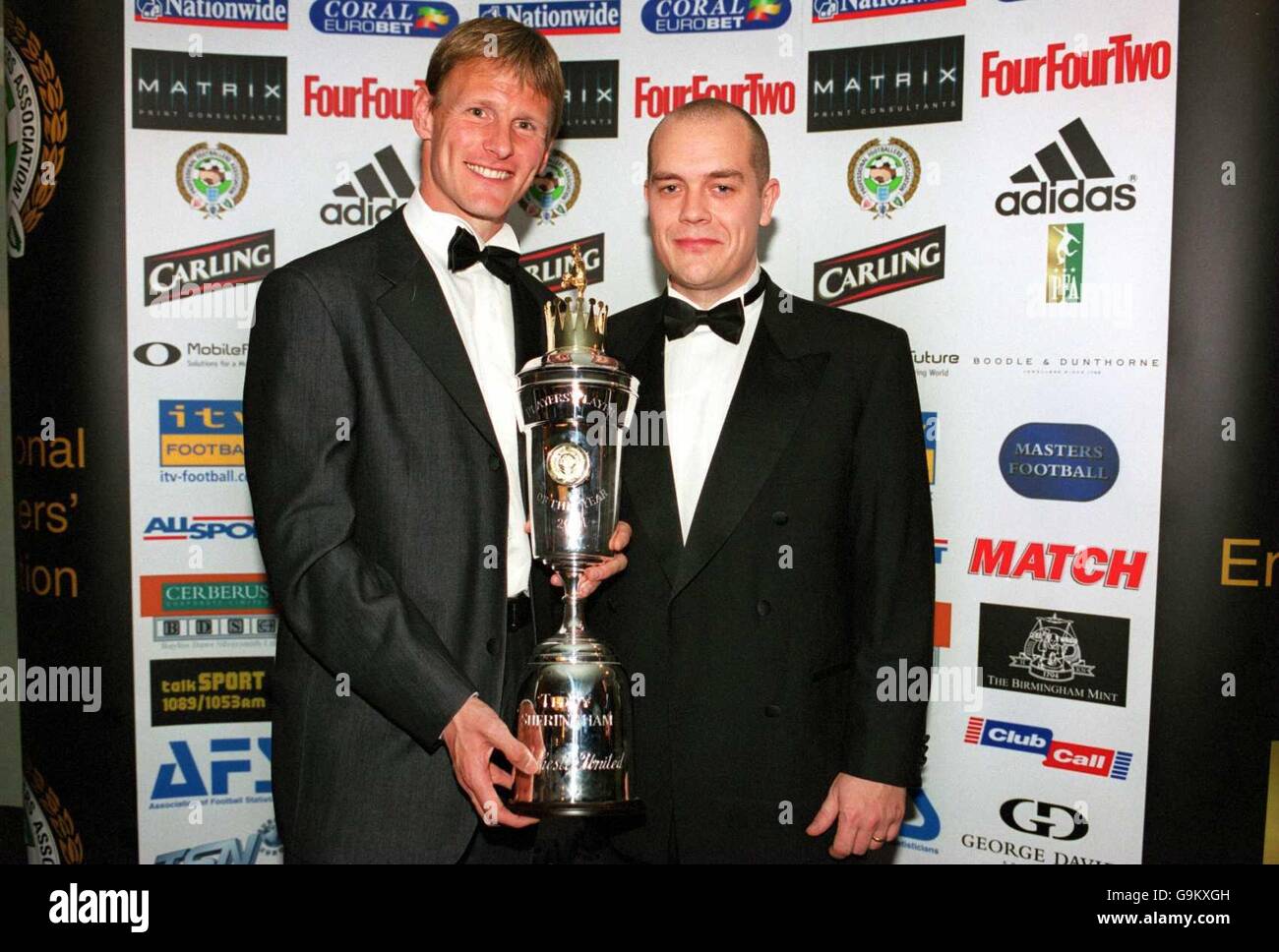 PFA Player of the Year Teddy Sheringham (l) poses for pictures with a ...