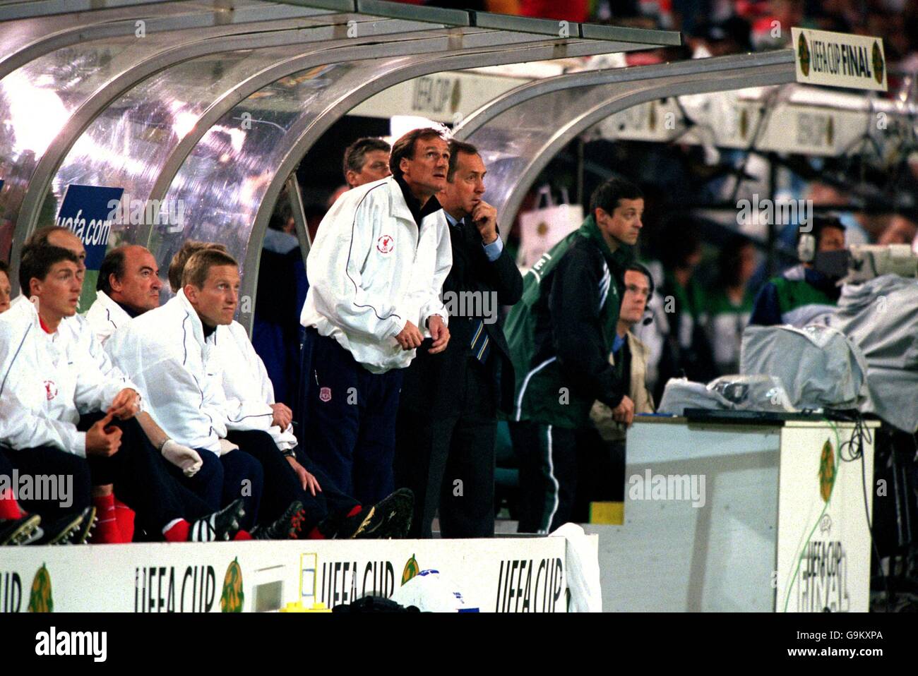 Liverpool's Assistant Manager Phil Thompson (l) watches the action ...