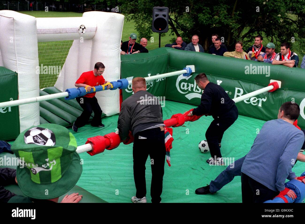 Fans enjoy a game of human table football hi-res stock photography and ...