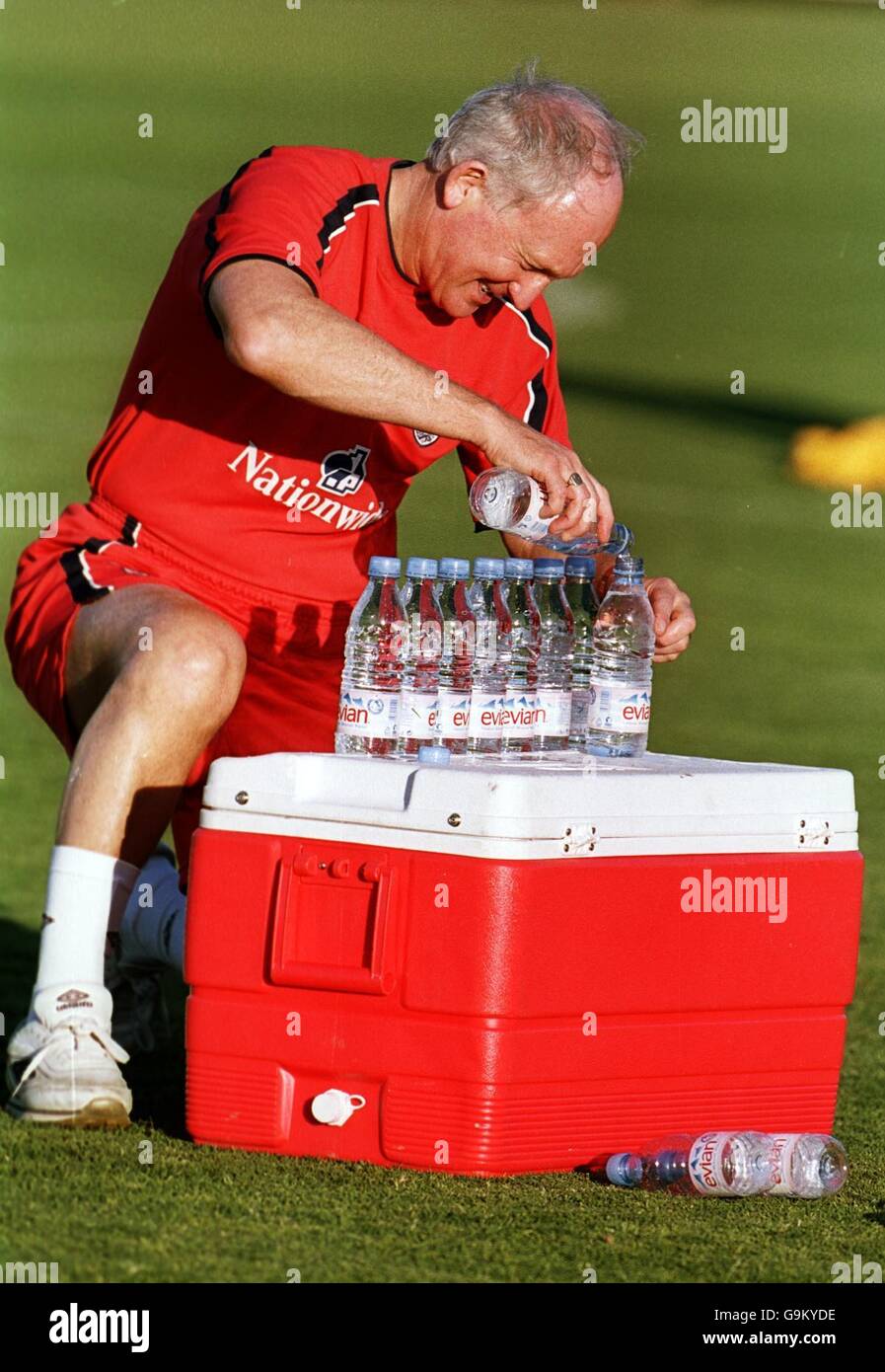 England's assistant coach Tord Grip checks on the fresh water supply ...