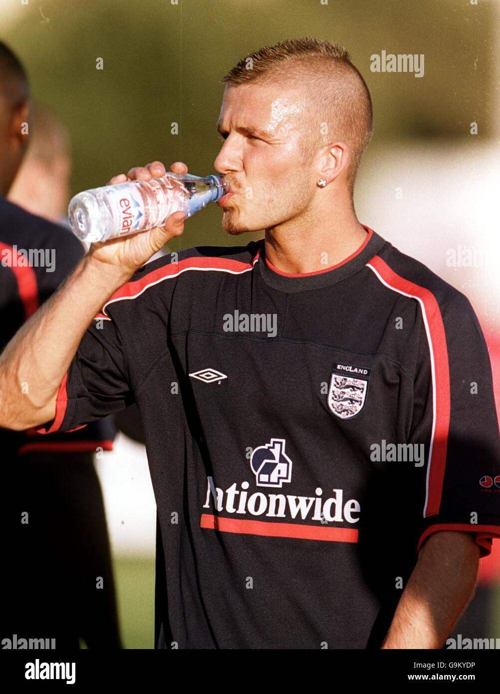 Englands david beckham takes a well earned drink after training hi-res ...