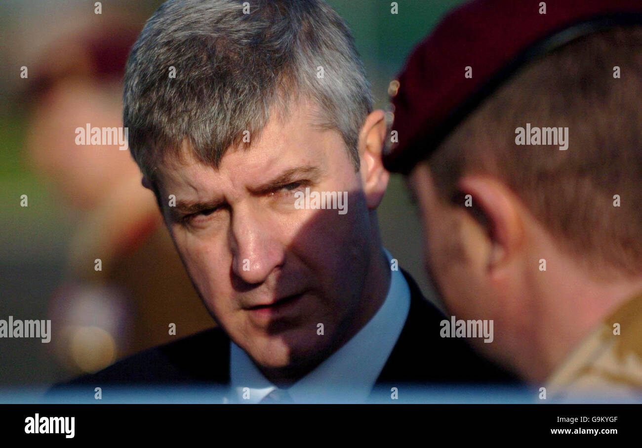 Defence Minister Derek Twigg MP, chats to servicemen at the opening of ...