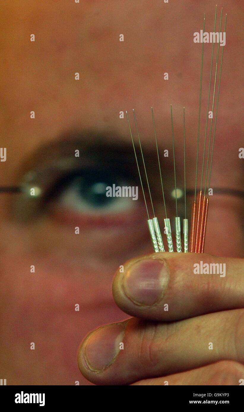 Acupuncture is a system of medicine using the insertion of needles into ...