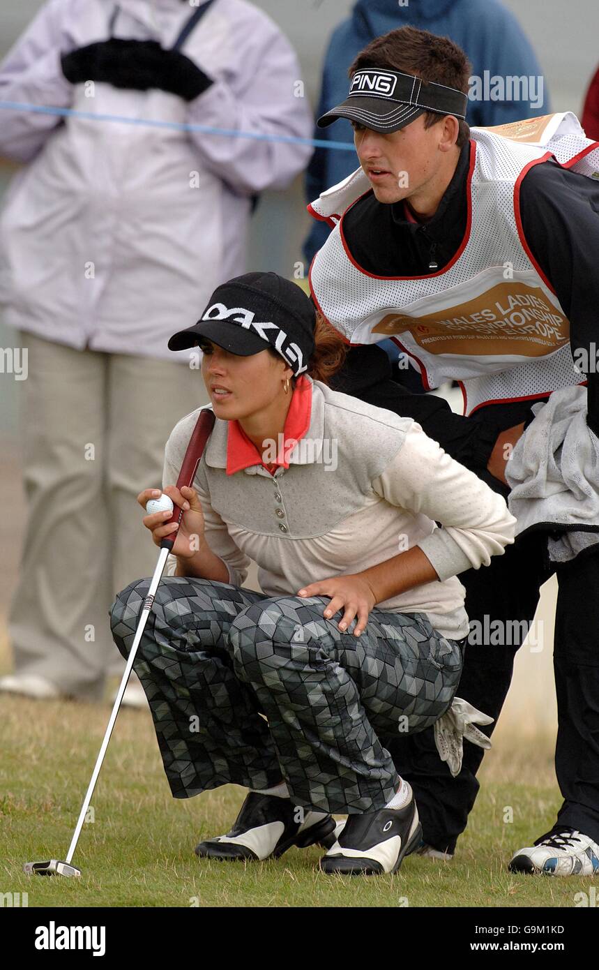 Australias nikki garrett lines up a putt with her caddie hi-res stock ...