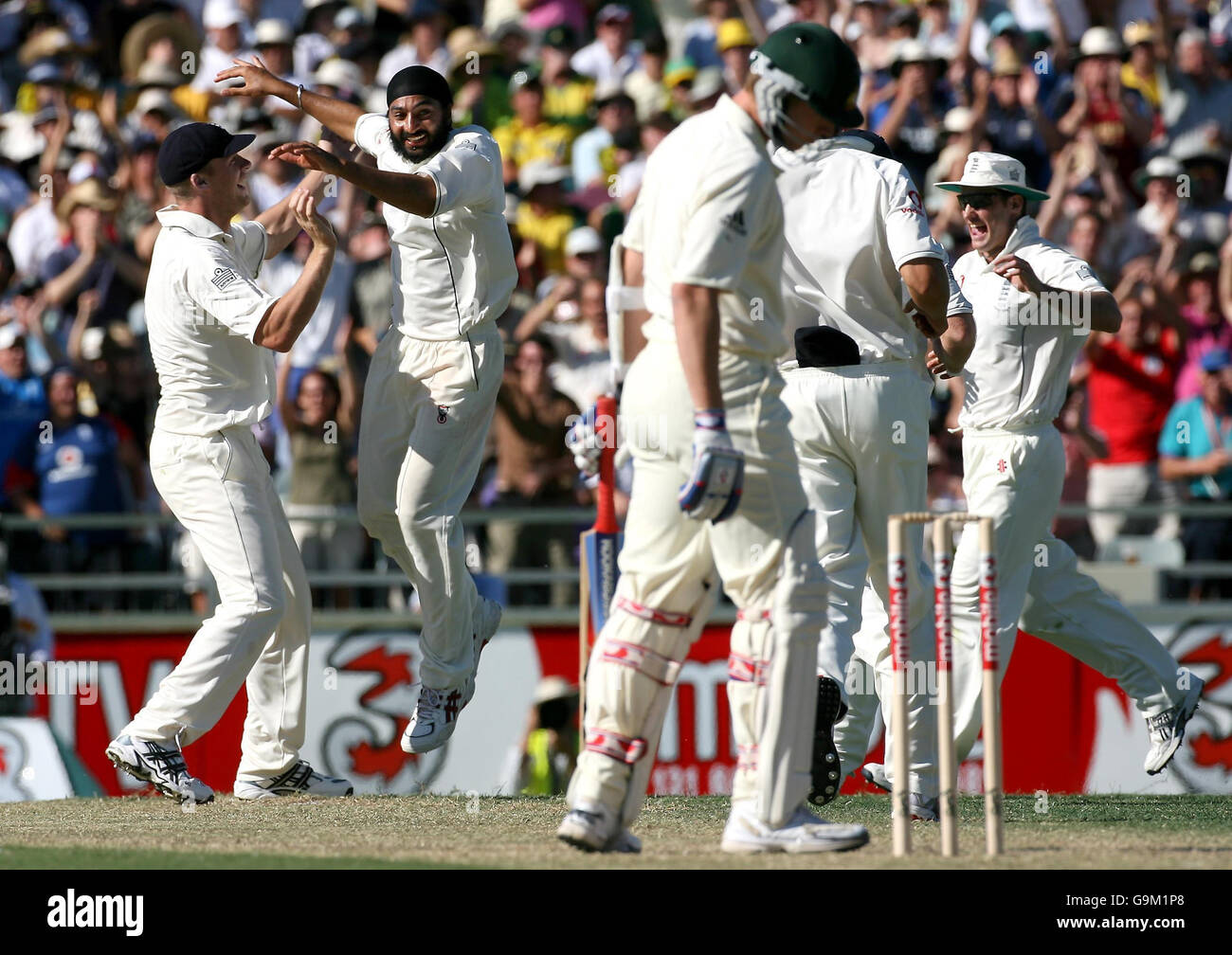 England's Monty Panesar celebrates with captain Andrew Flintoff (left ...