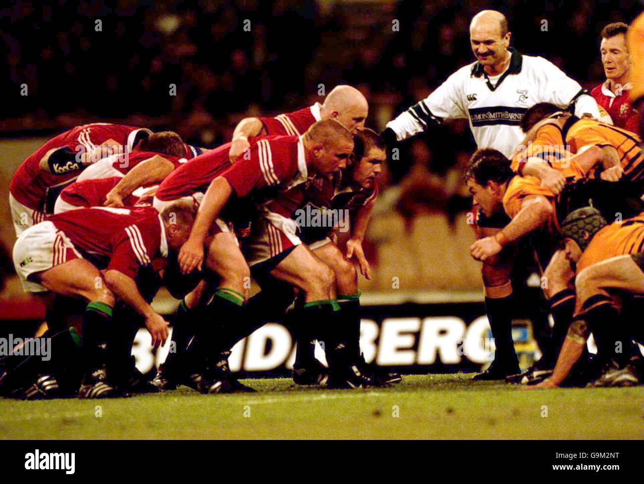 The British Lions front row pack down for a scrum under the control of ...
