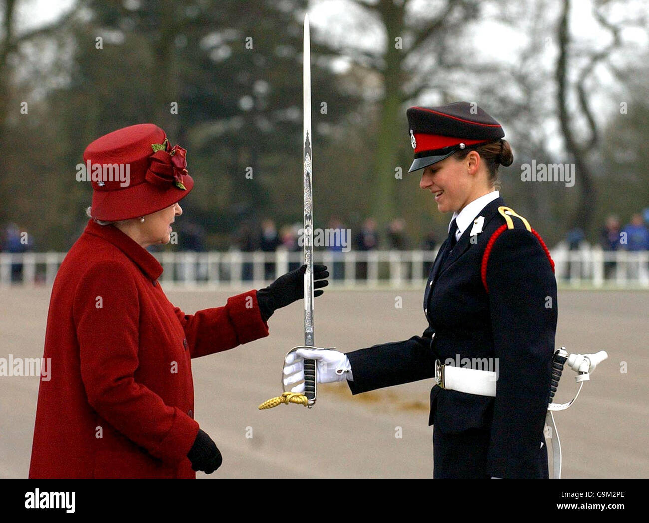 Britain's Queen Elizabeth II presents the Sword of Honour to Junior ...