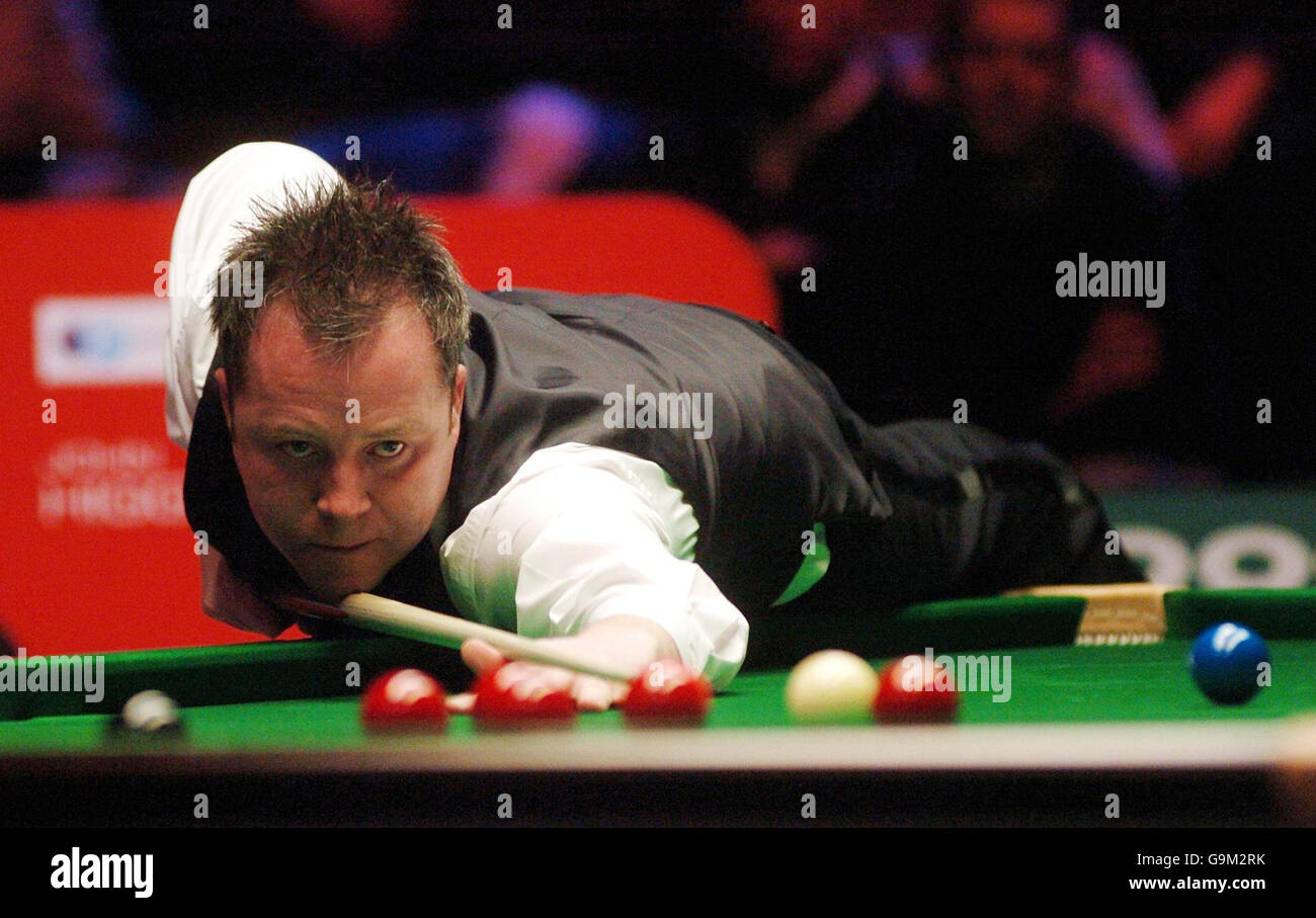 Scotland's John Higgins plays a shot during the Maplin UK Snooker ...