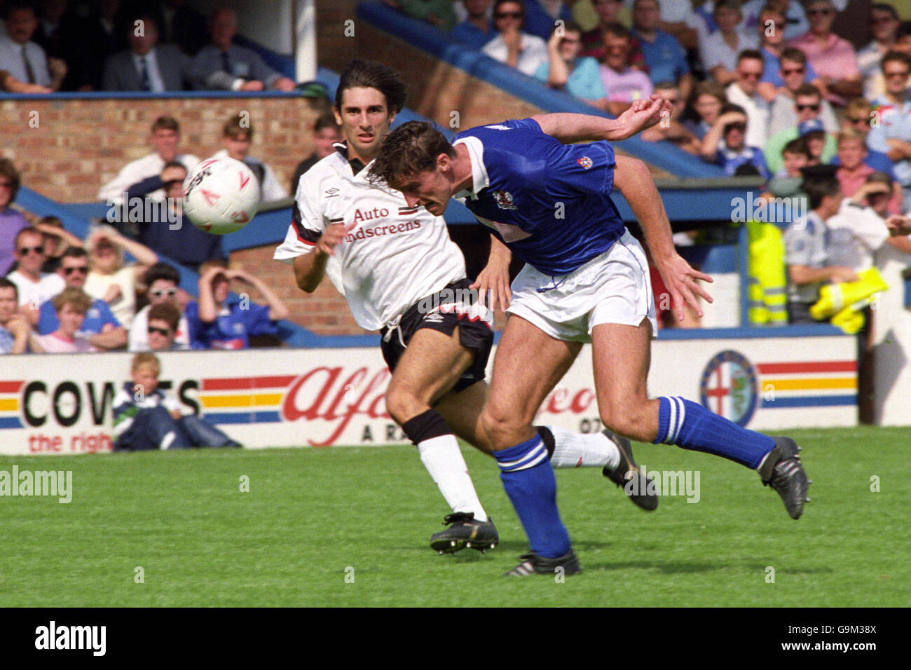 PETERBOROUGH V DERBY COUNTY. LEE HOWARTH STEPS IN TO CLEAR THE BALL ...