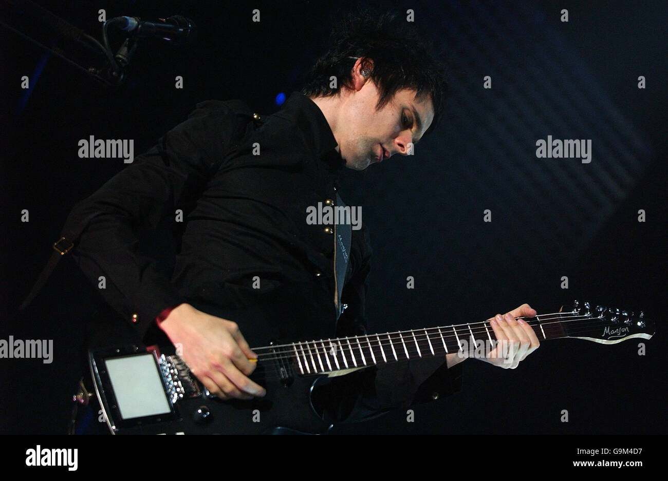 Muse in concert - London. Muse frontman Matt Bellamy performs at ...