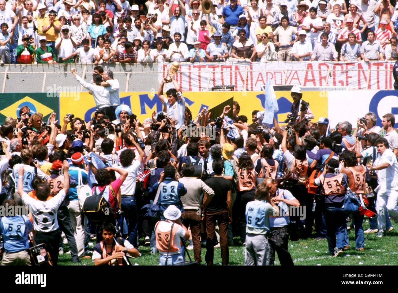 Argentina captain Diego Maradona is carried shoulder-high as he takes ...