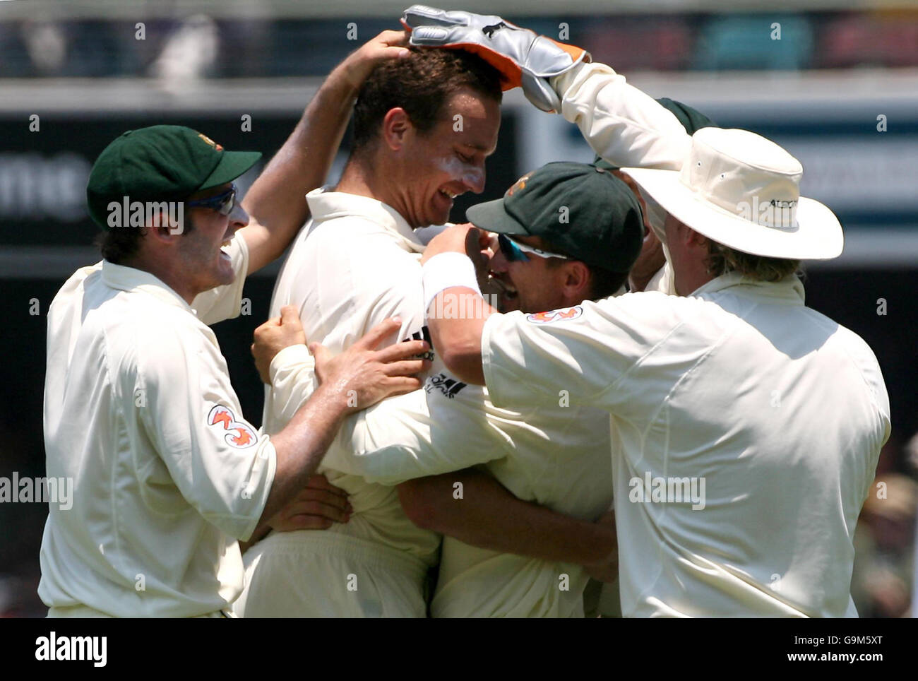 Australia's Stuart Clark celebrates with teammates after dismissing ...