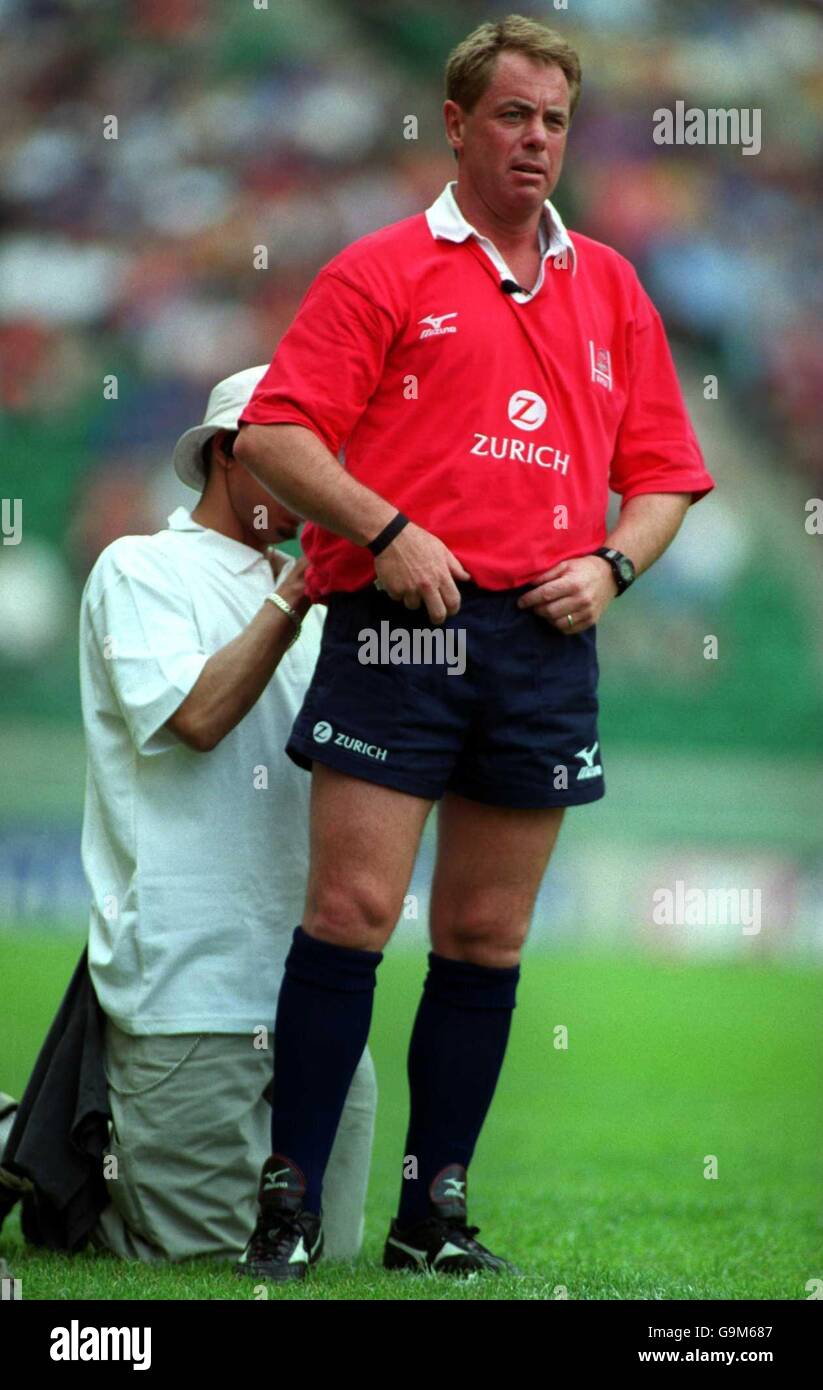 Referee steve lander has his microphone adjusted hi-res stock ...