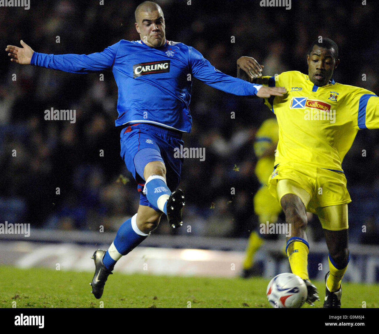 Rangers' Filip Sebo and Simon Ford of Kilmarnock battle for the ball ...