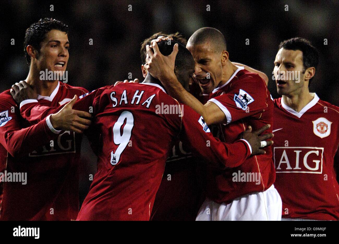 Manchester United's Louis Saha celebrates his goal with Rio Ferdinand ...