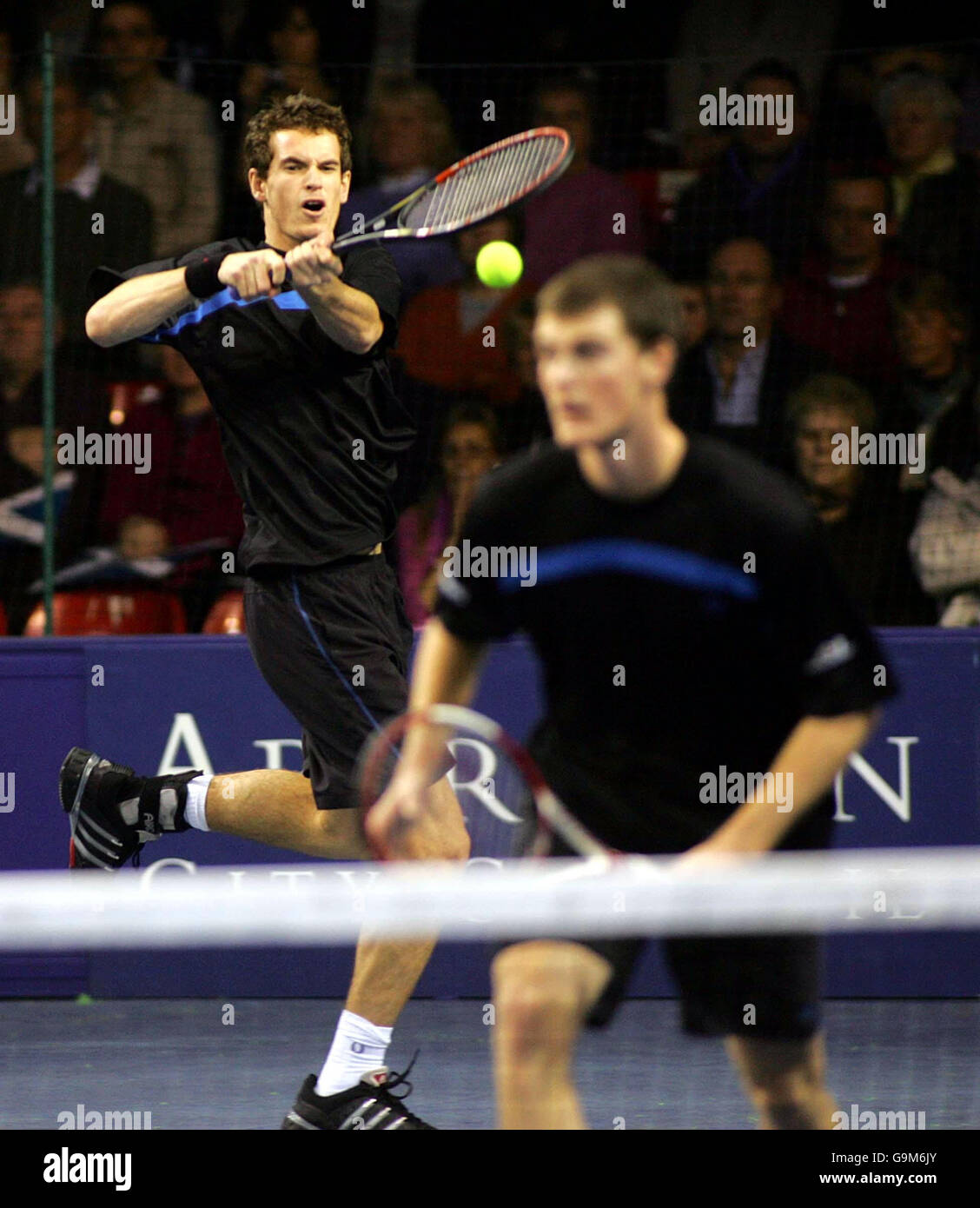 Scotland's Andy Murray (left) and brother Jamie in action against ...