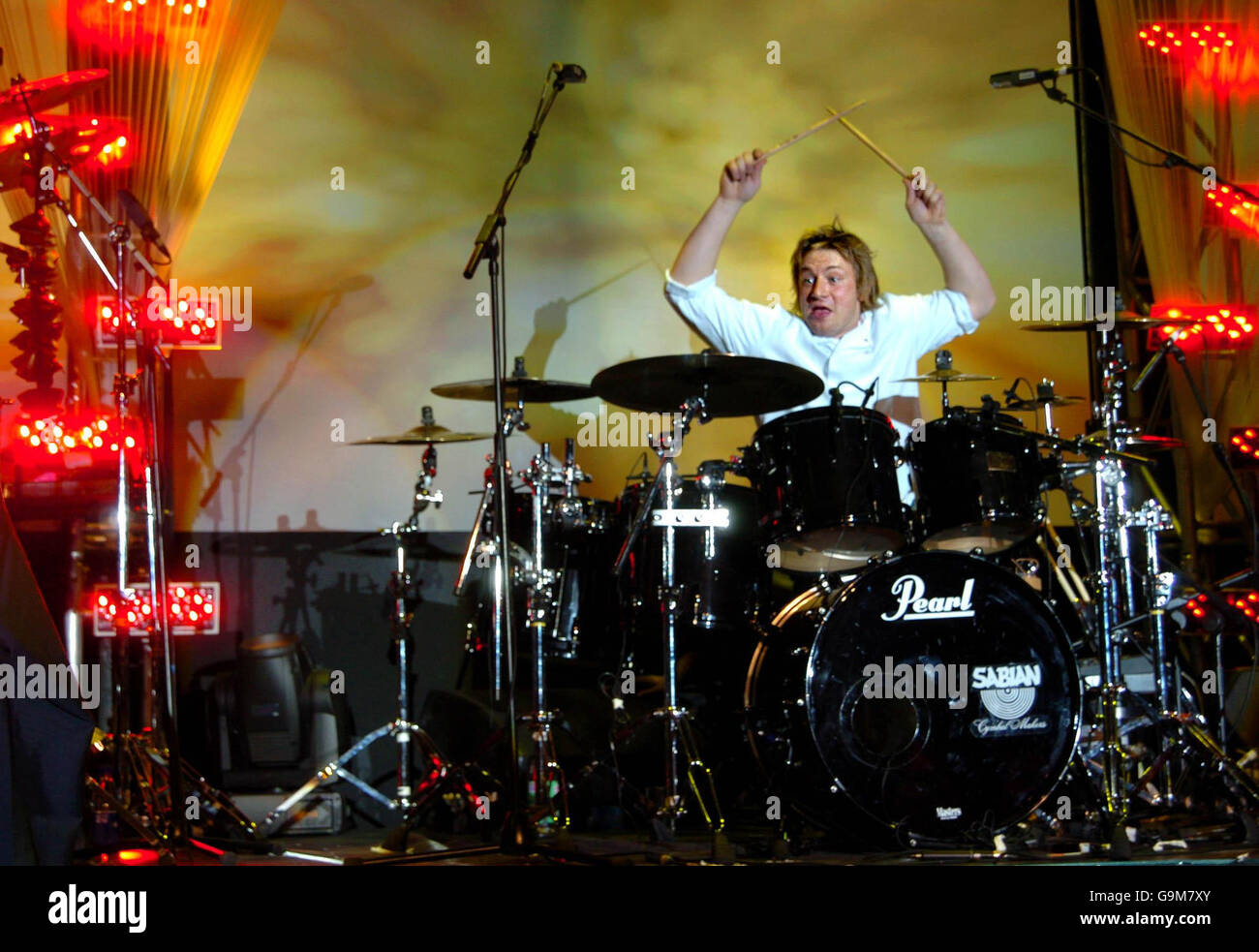 TV Chef Jamie Oliver, with singer Lemar, plays the drums as he hosts ...