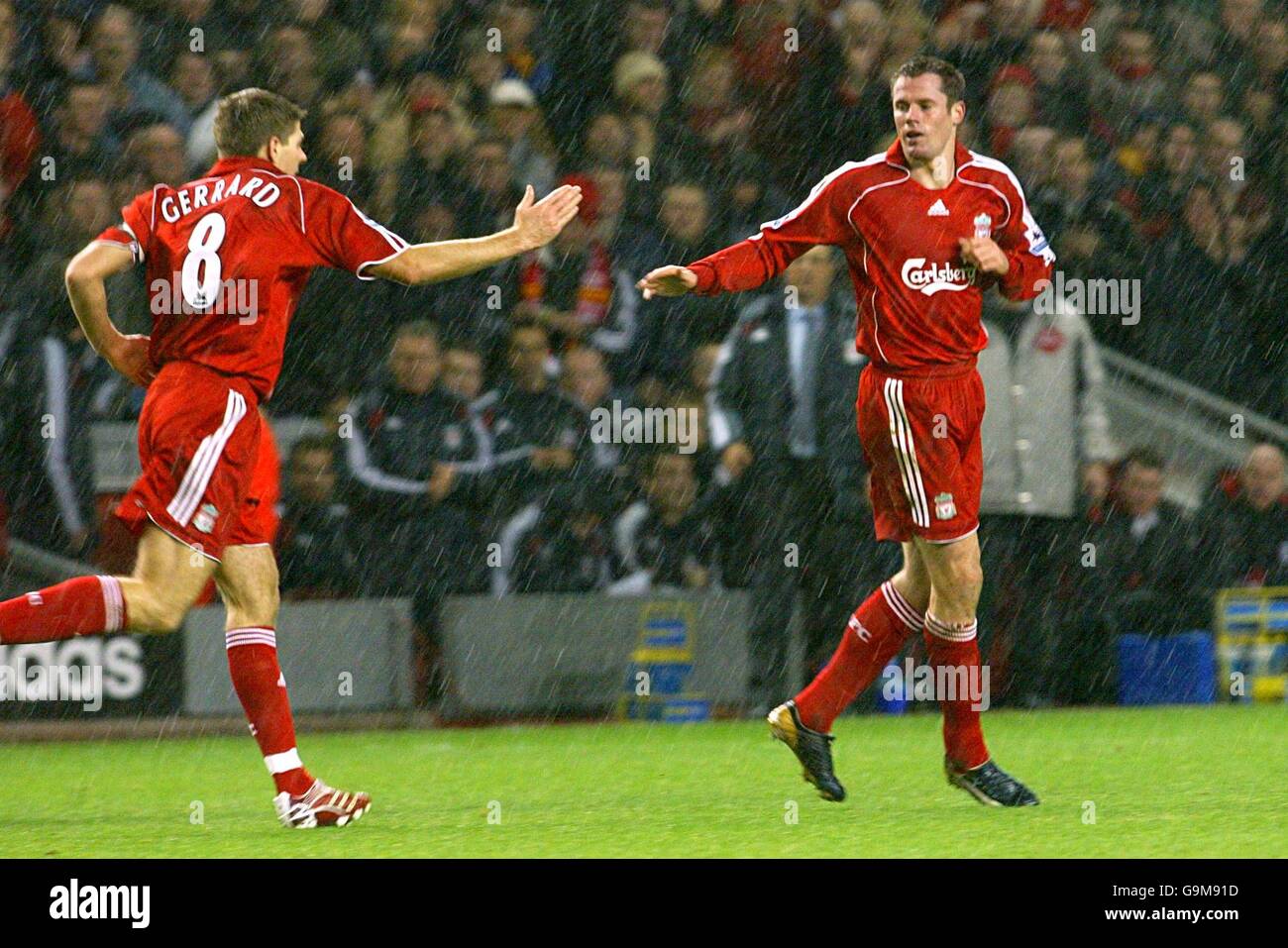 Liverpool's Jamie Carragher celebrates with Steven Gerrard (l) after ...