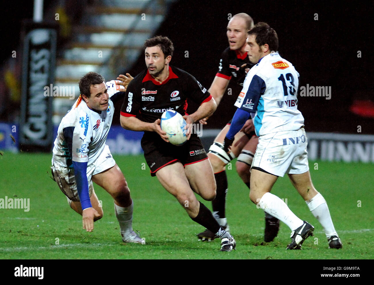 Saracens' Kevin Sorrell evades the tackle of G.R.A.N Parma's Matteo ...
