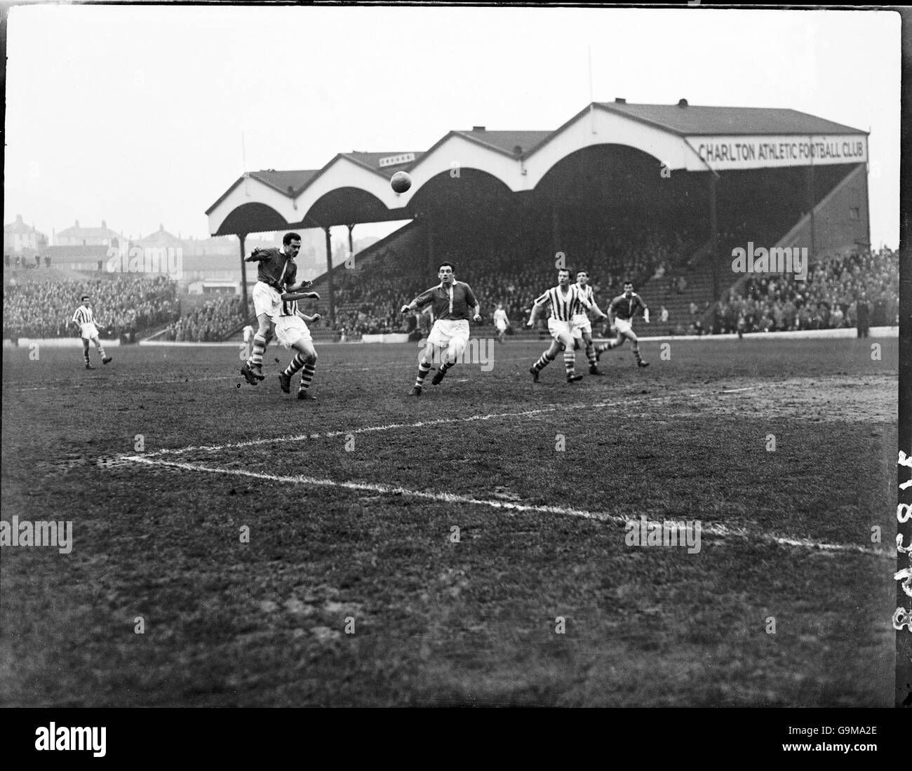 Charlton Athletic's Stuart Leary (l) beats Huddersfield Town's Jack ...