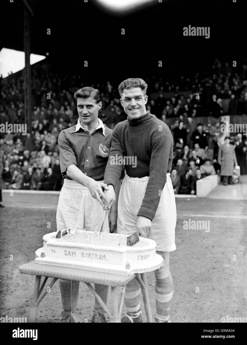 (L-R) Portsmouth's Jimmy Dickinson helps Charlton Athletic goalkeeper ...