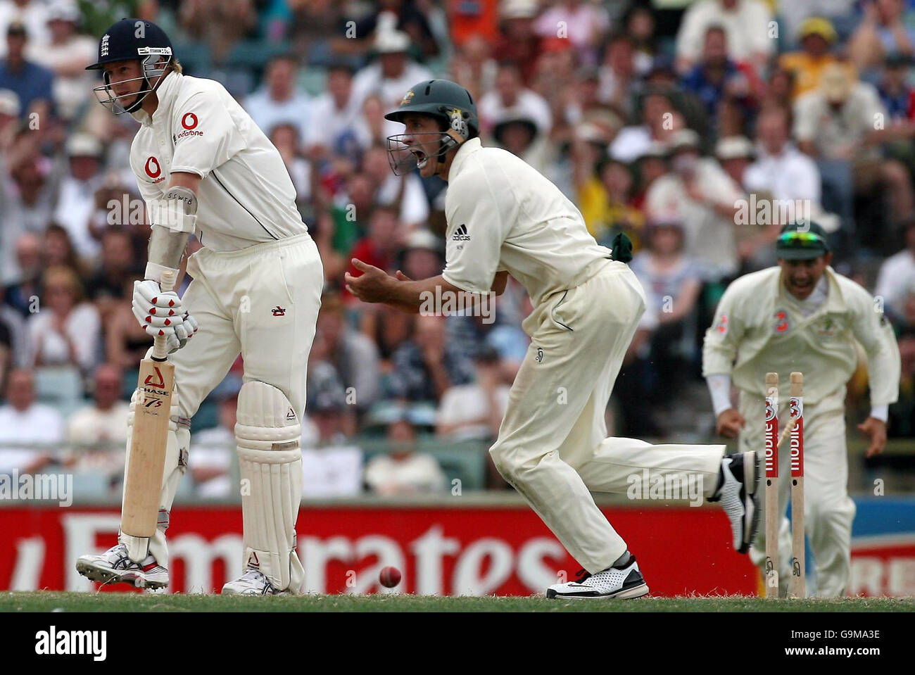 Australia's Michael Hussey runs in to celebrate after Glenn McGrath clean bowled England's ...