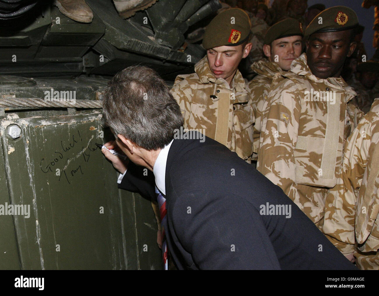 Britain's Prime Minister Tony Blair (L) visits British troops in Basra ...