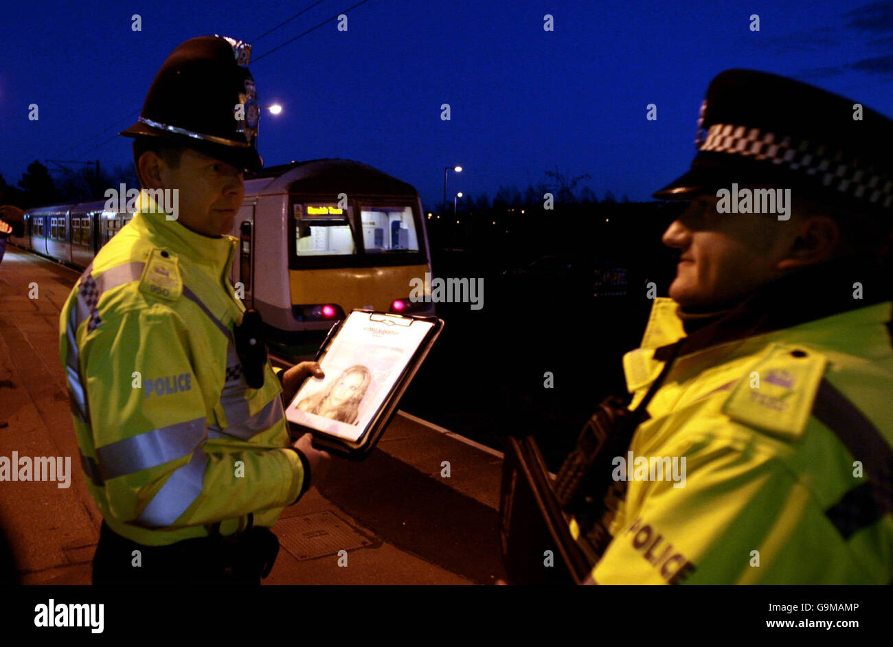 Police officers at Manningtree Railway station, Essex, where they ...
