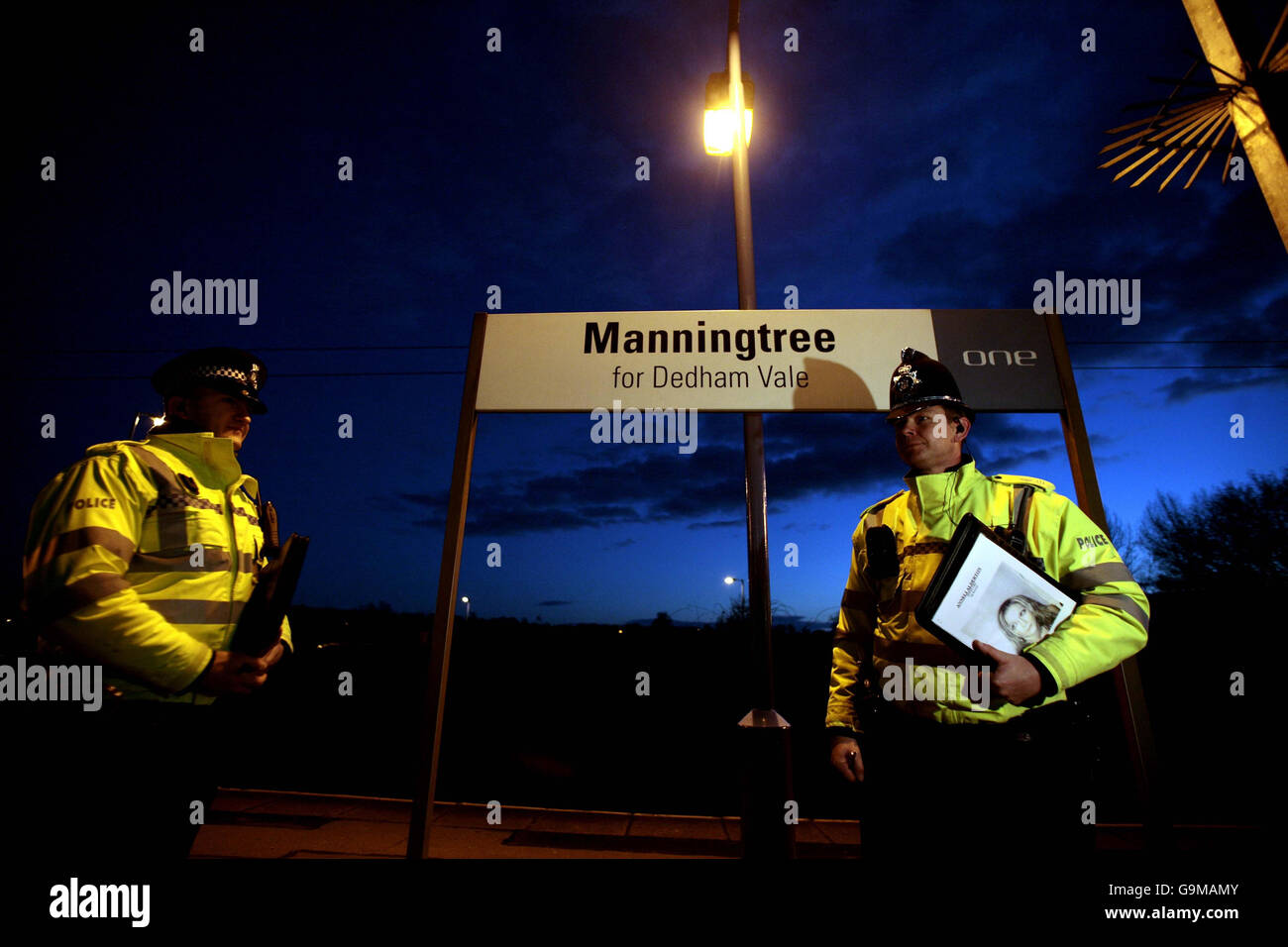 Police officers at Manningtree railway station, Essex, where they are ...