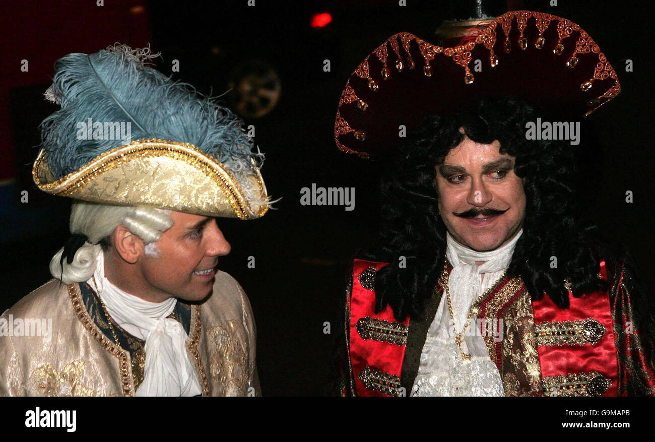 Singer Elton John (right) and his partner David Furnish (left) arrive ...