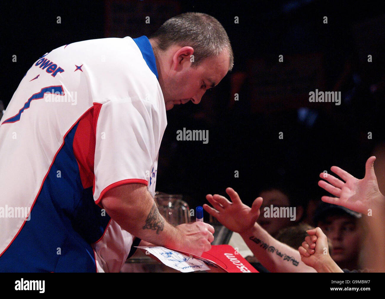 England's World Champion Phil Taylor signs autographs after beating ...