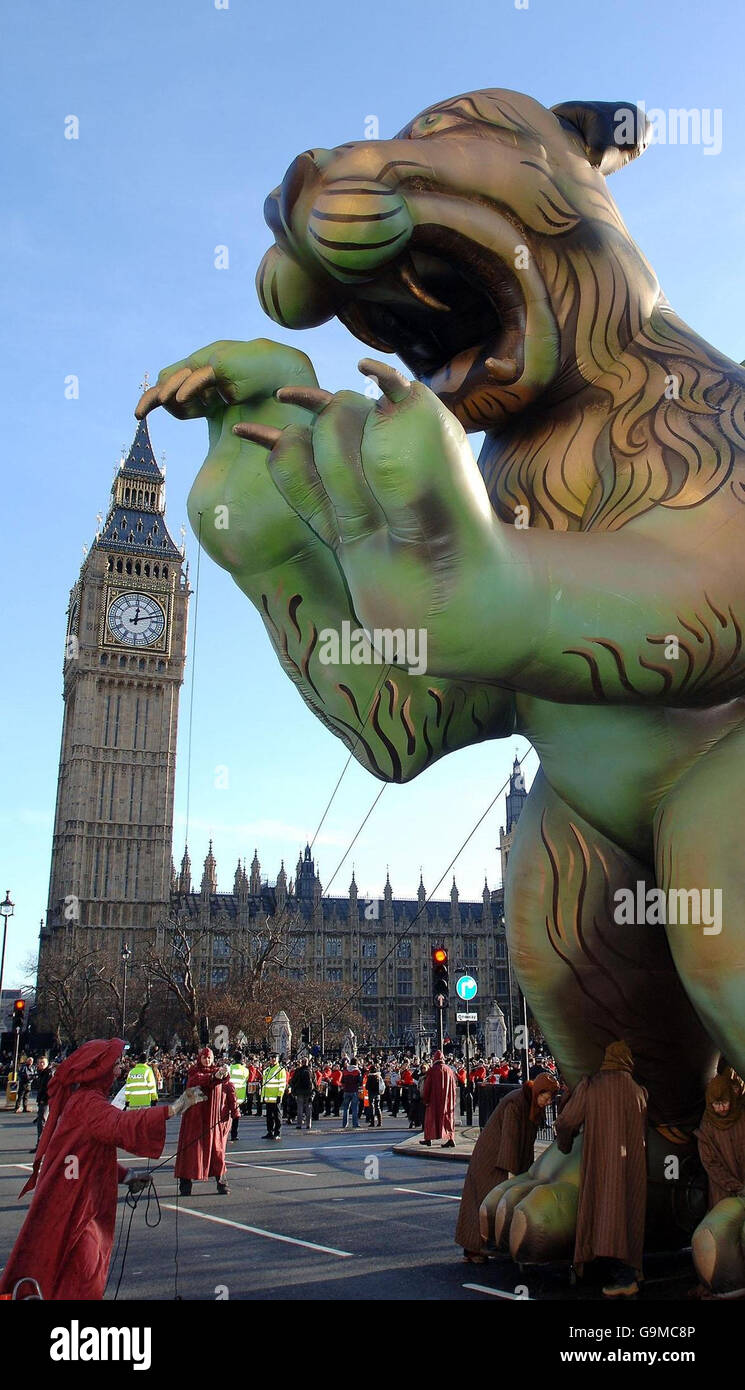 New Year's Day Parade. A giant inflatable tiger is cajoled into taking ...