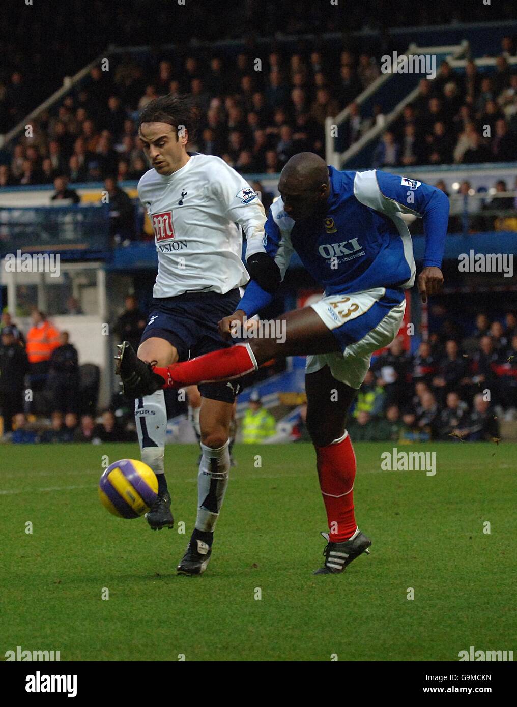 Portsmouth's Sol Campbell and Tottenham Hotspur's Dimitar Berbatov (l ...