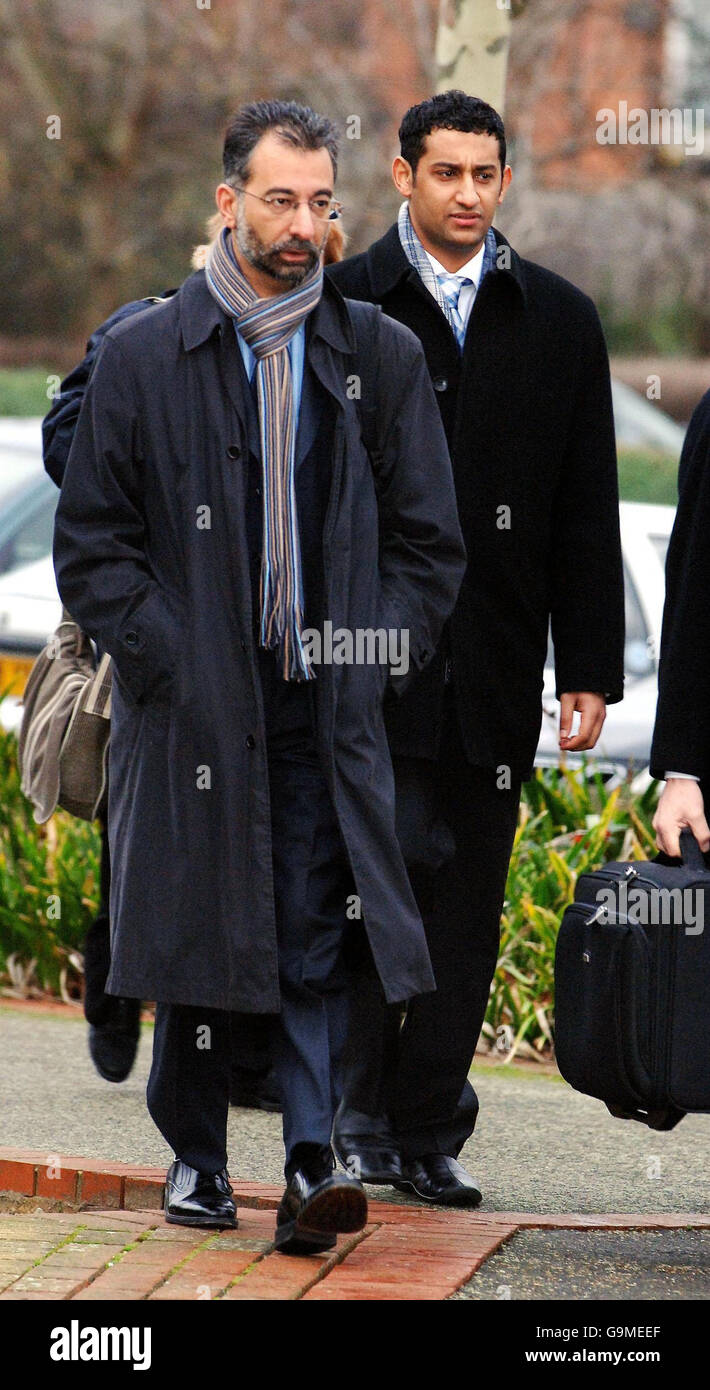 Mr Adel Yahya (right) arrives at Woolwich Crown Court in south London ...