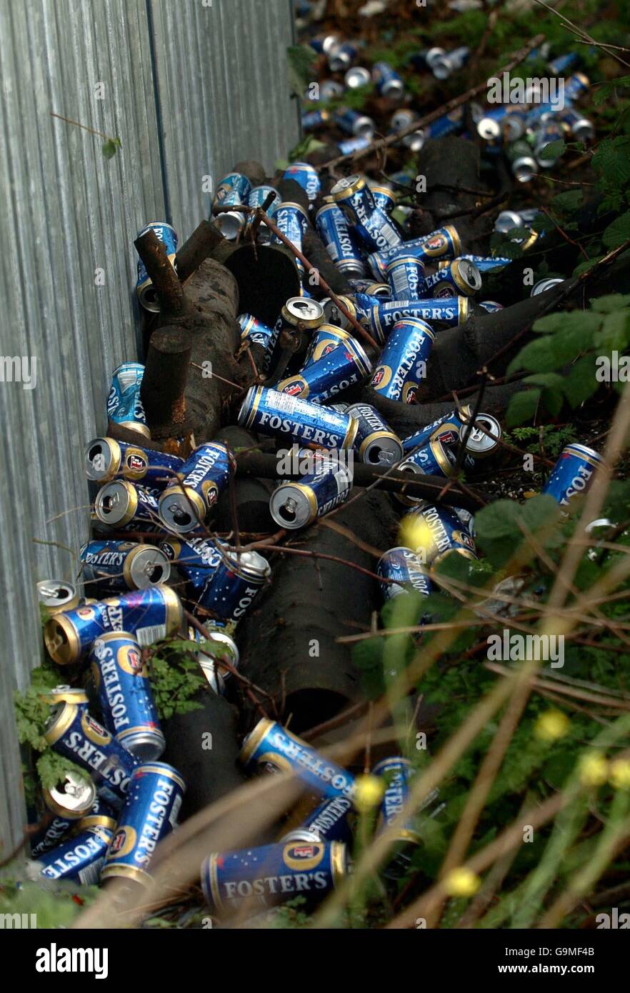 Urban decay stock: Discarded beer cans litter a walkway in Stratford ...