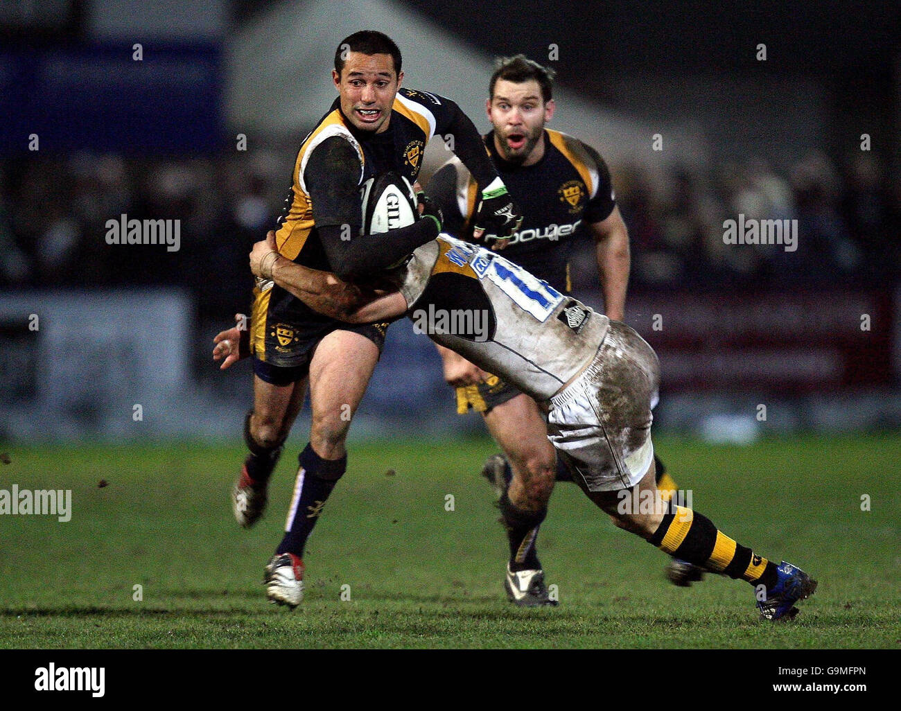 Worcester's Shane Drahm is tackled by Wasps' Dominic Waldouck during ...